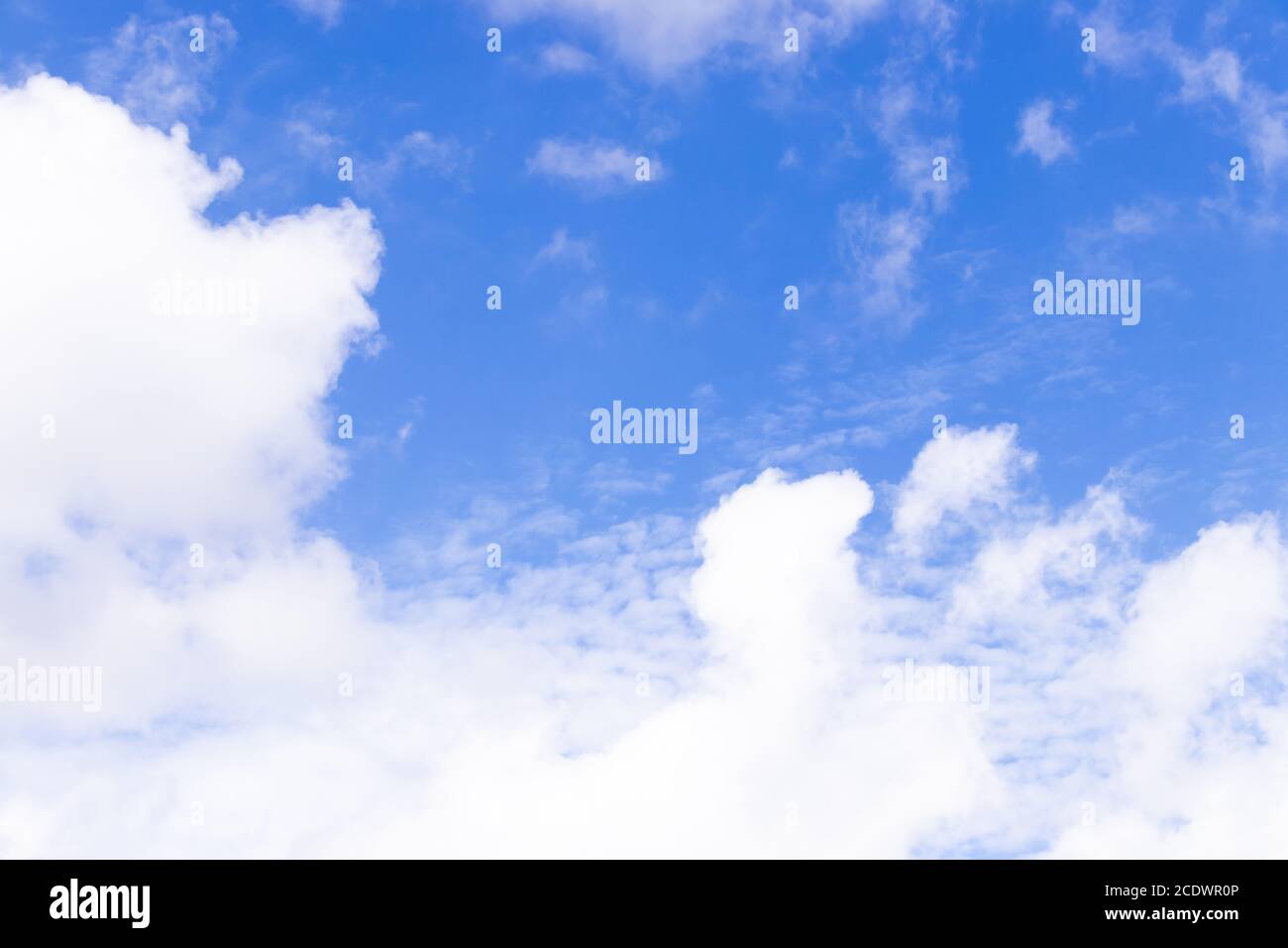Clear blue color sky with white cloud background Stock Photo - Alamy