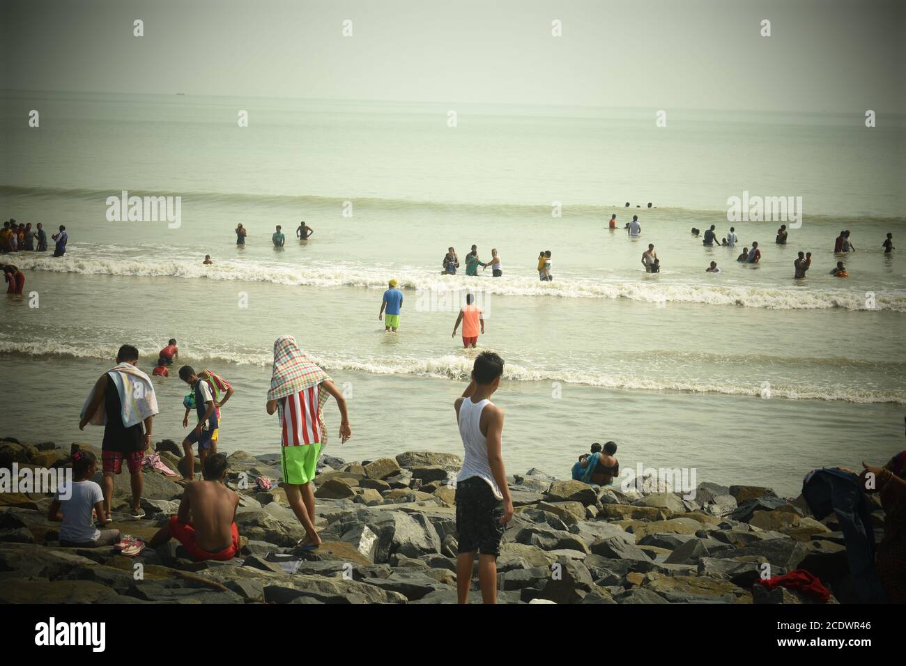 people enjoying sea bath at digha sea beach, midnapore,west bengal ...