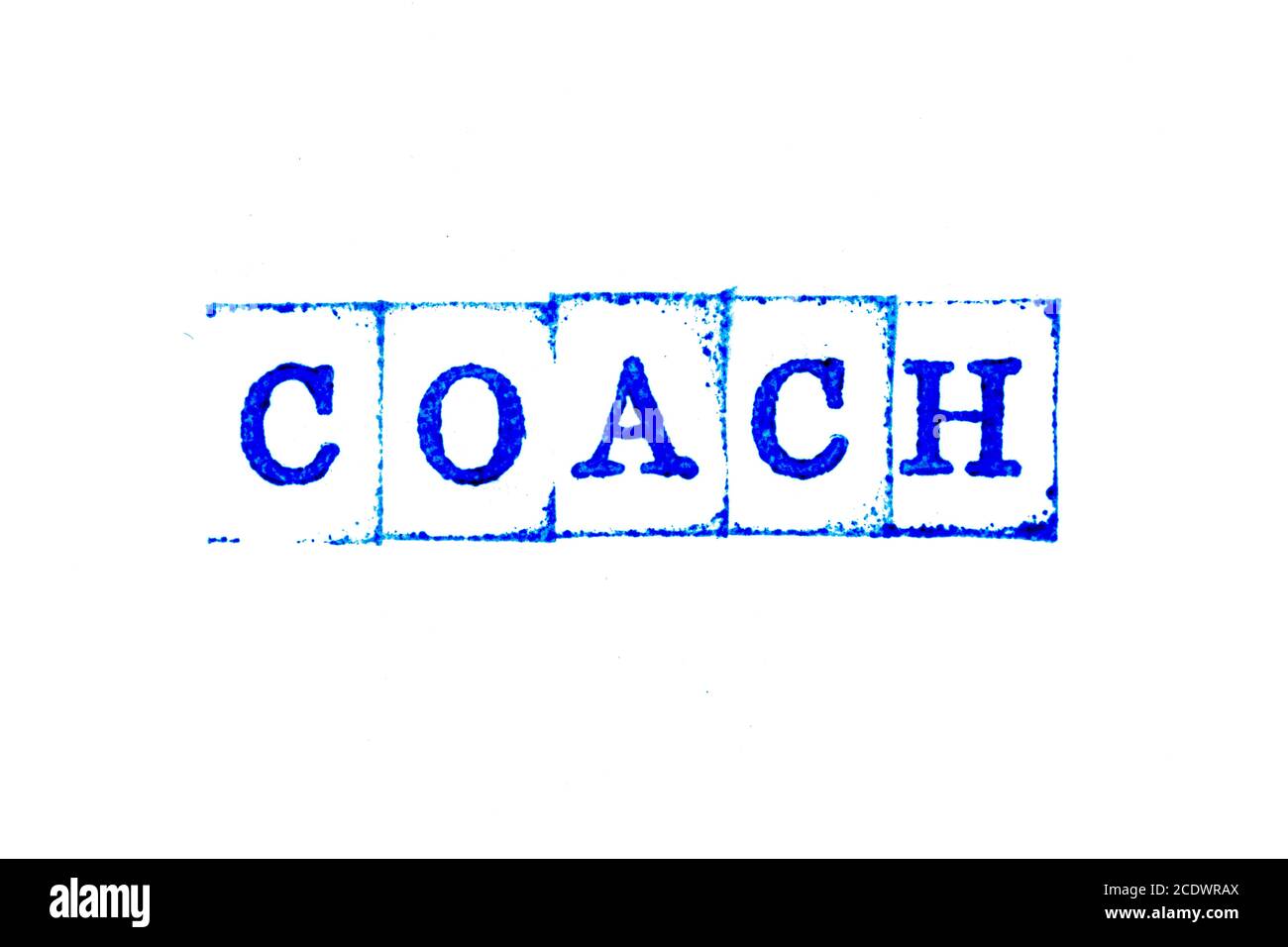 Blue color ink of rubber stamp in word coach on white paper background ...