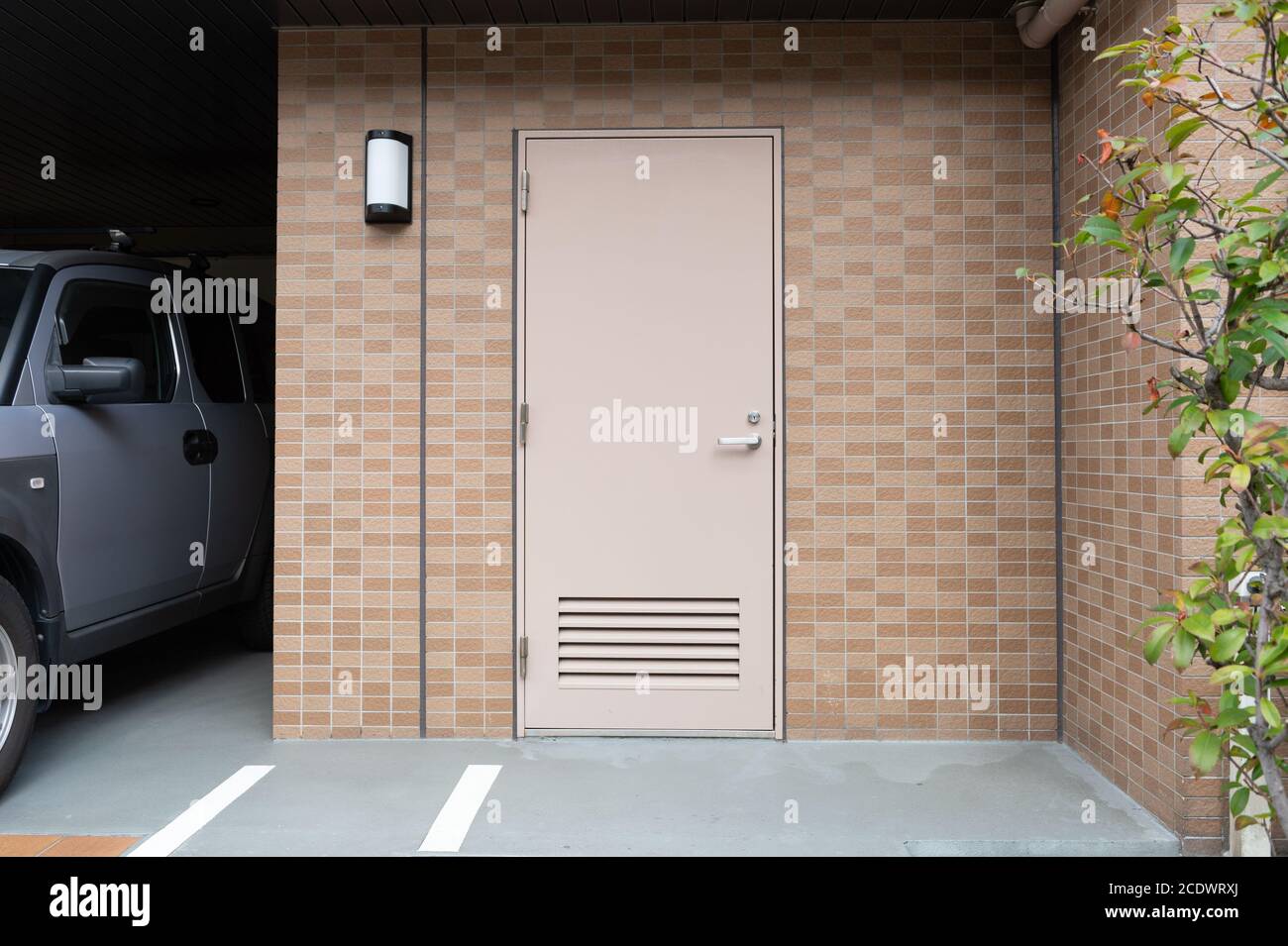 sidewalk by street wall & door Stock Photo - Alamy
