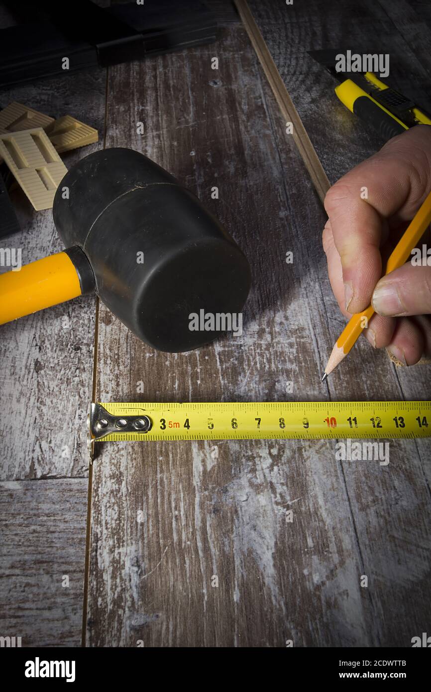 Tools for laying laminate Stock Photo - Alamy