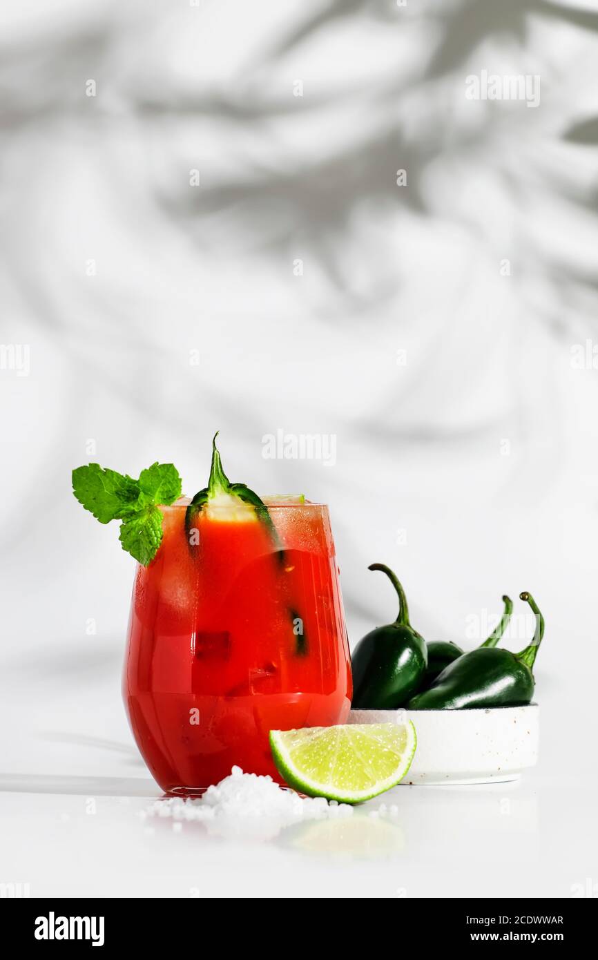 Spicy alcoholic cocktail with vodka, tomato juice, jalapeno pepper ...