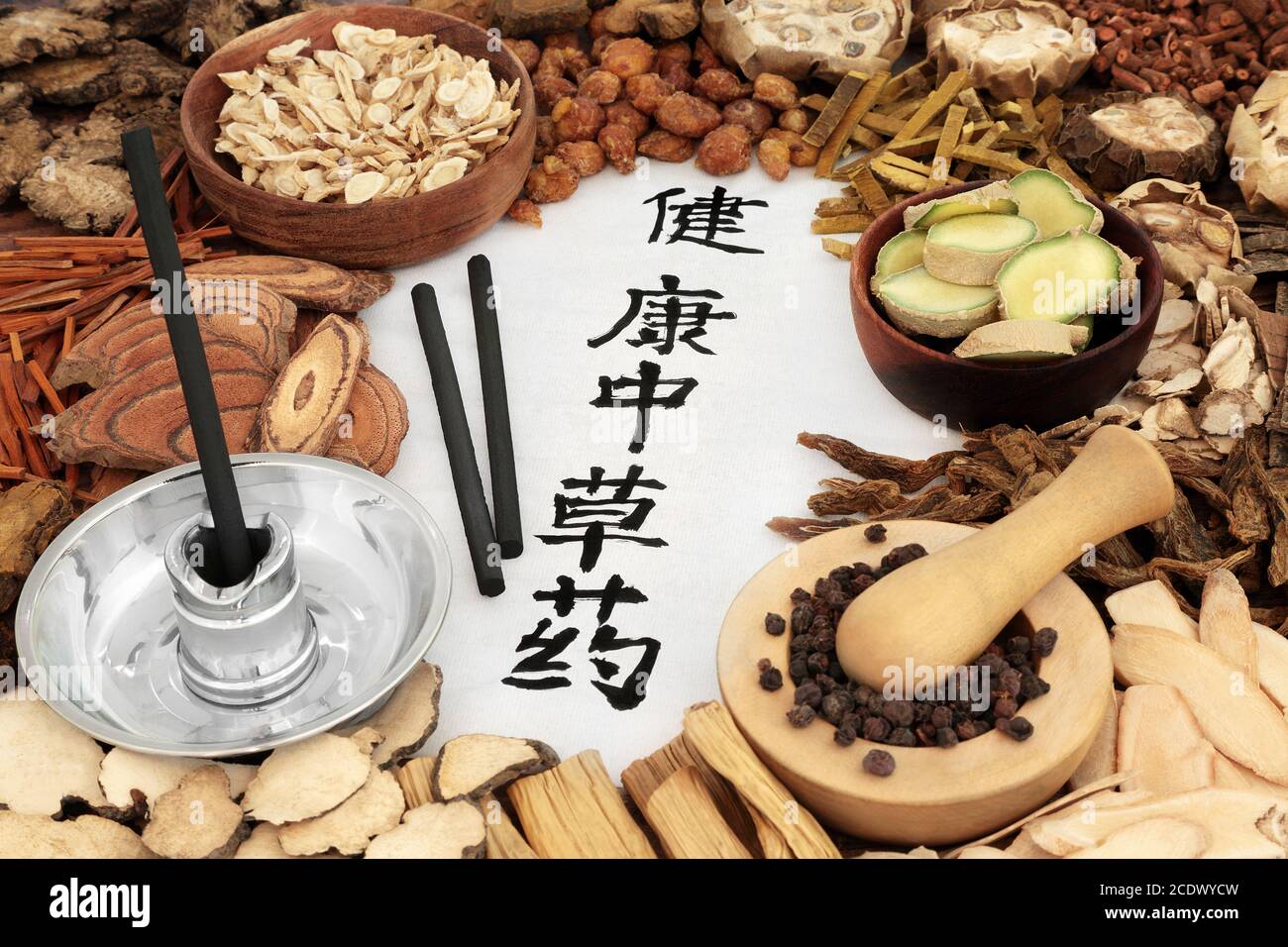 Chinese herbal medicine with herb, spices & calligraphy script with ...