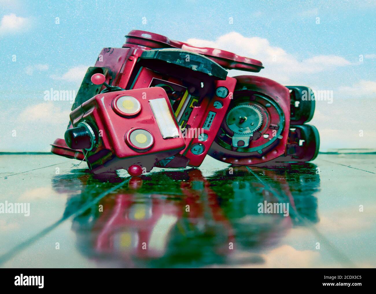 robot wars red robot defeated on old wooden floor Stock Photo - Alamy