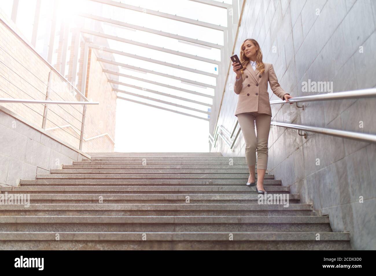 Coming down the stairs hi-res stock photography and images - Alamy