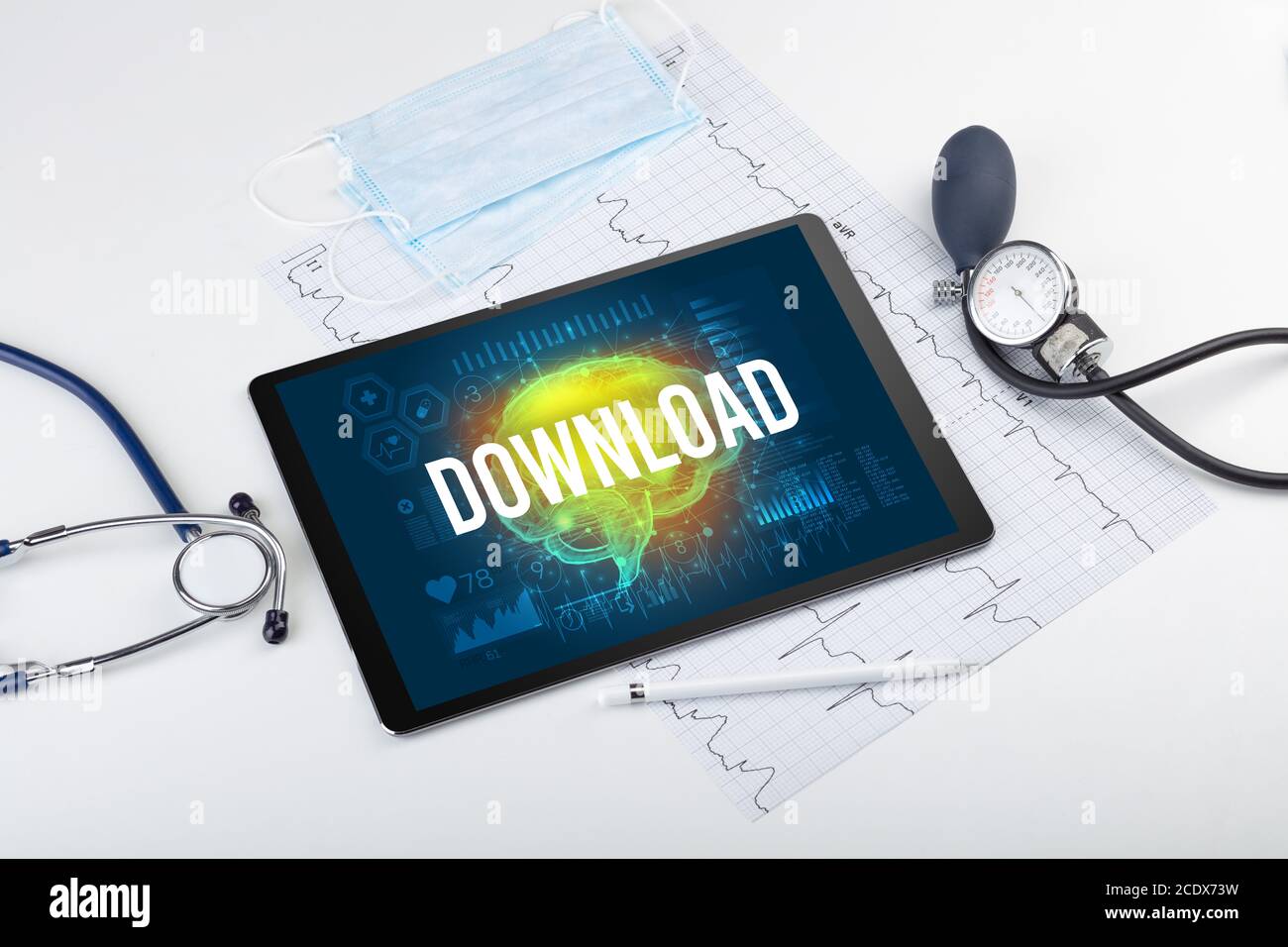 Tablet pc and medical tools with DOWNLOAD inscription, social ...