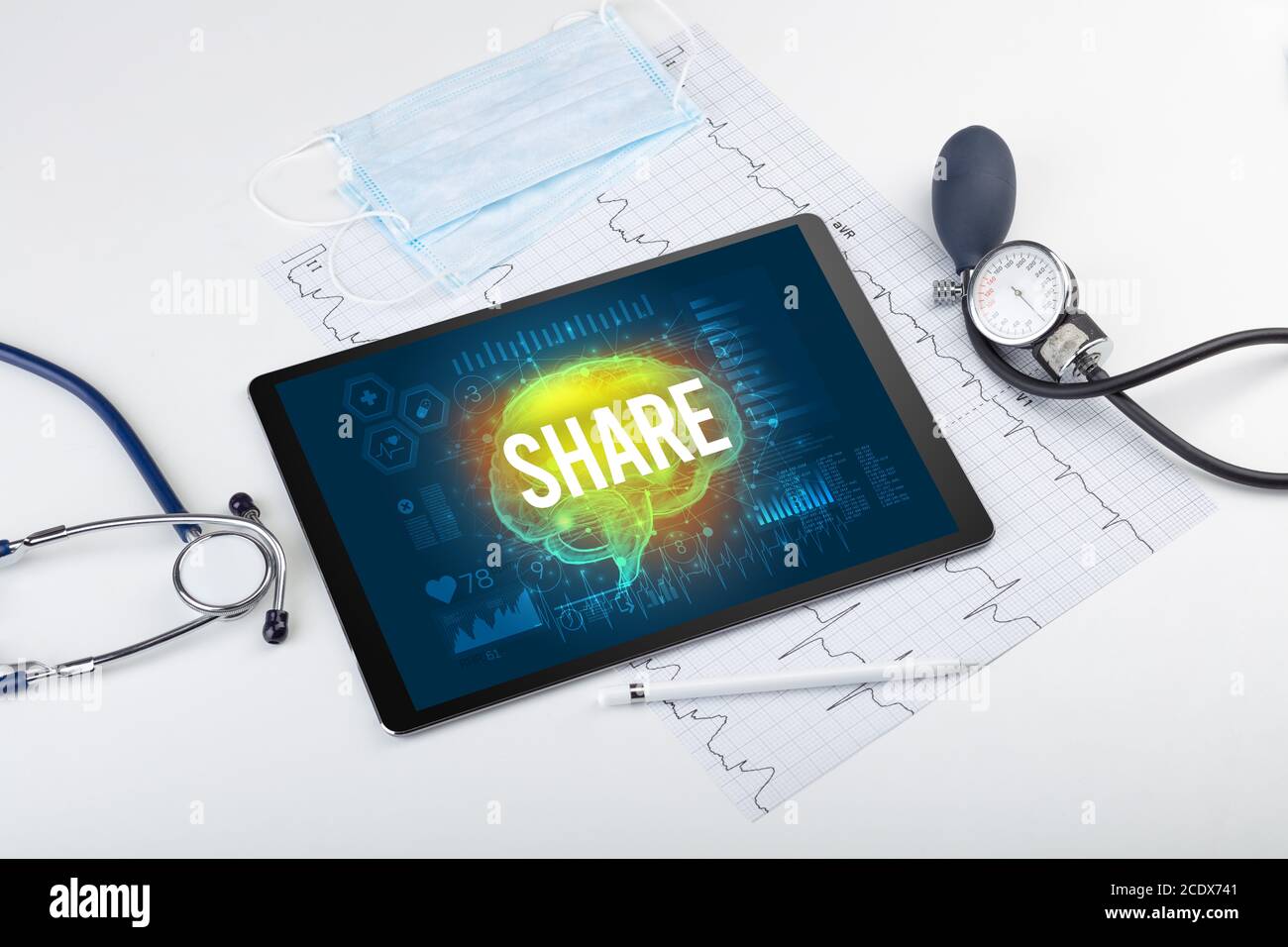Tablet pc and medical tools with SHARE inscription, social distancing ...