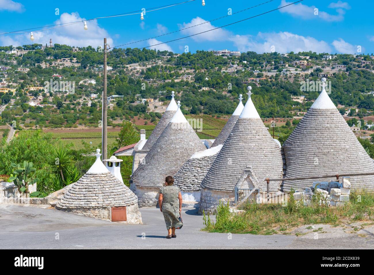 Group of beautiful Trulli, traditional Apulian dry stone hut old houses ...