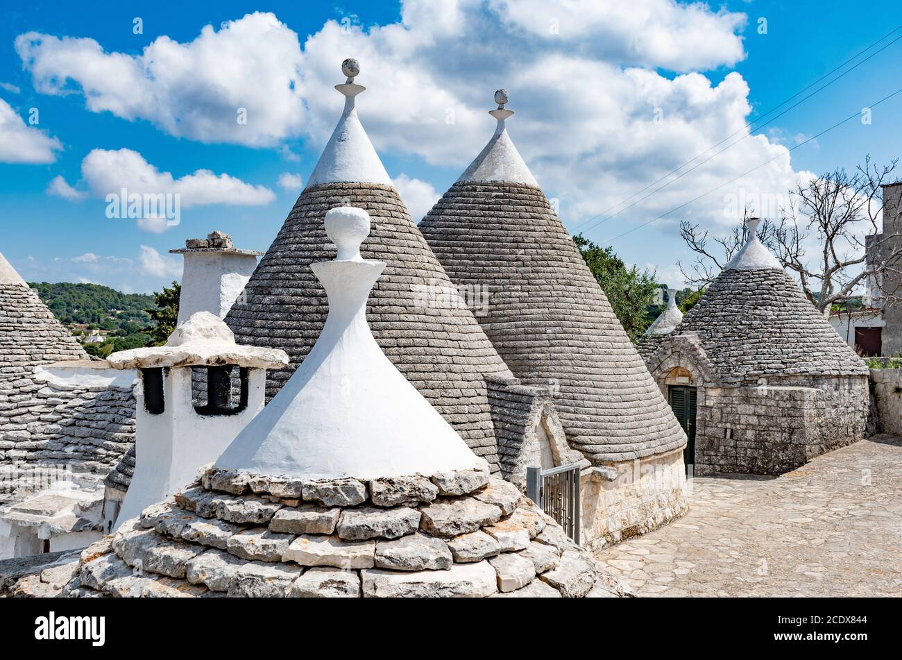 Group of beautiful Trulli, traditional Apulian dry stone hut old houses ...
