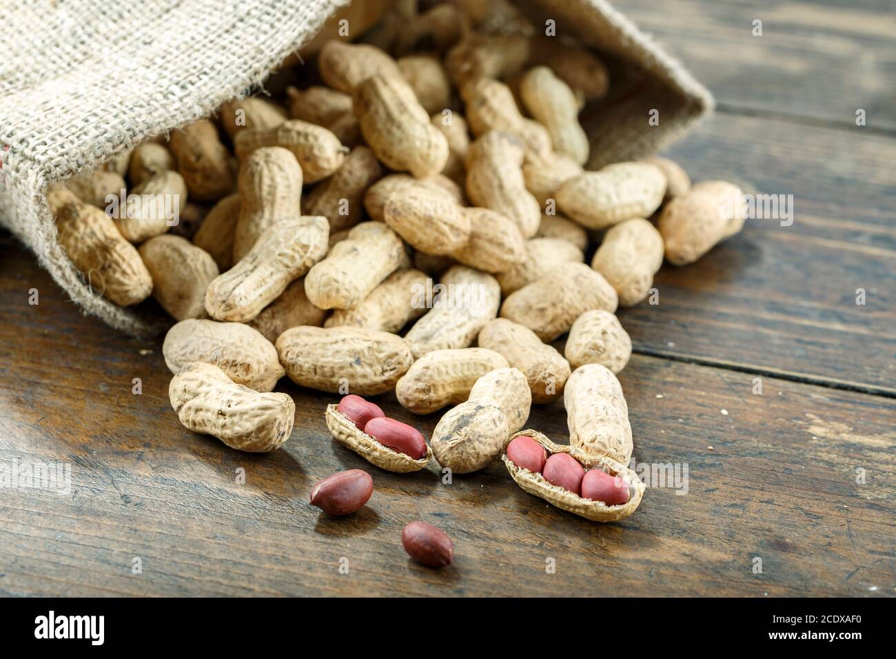 Peanuts in shell fly up hi-res stock photography and images - Alamy