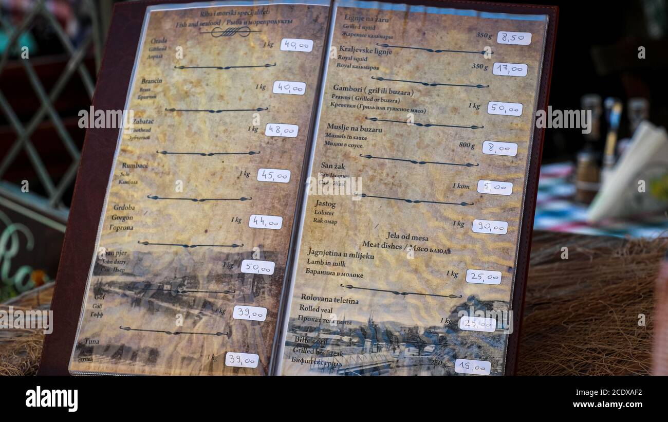 A menu of Montenegrin Cuisine in a cafe in the old town in Kotor ...