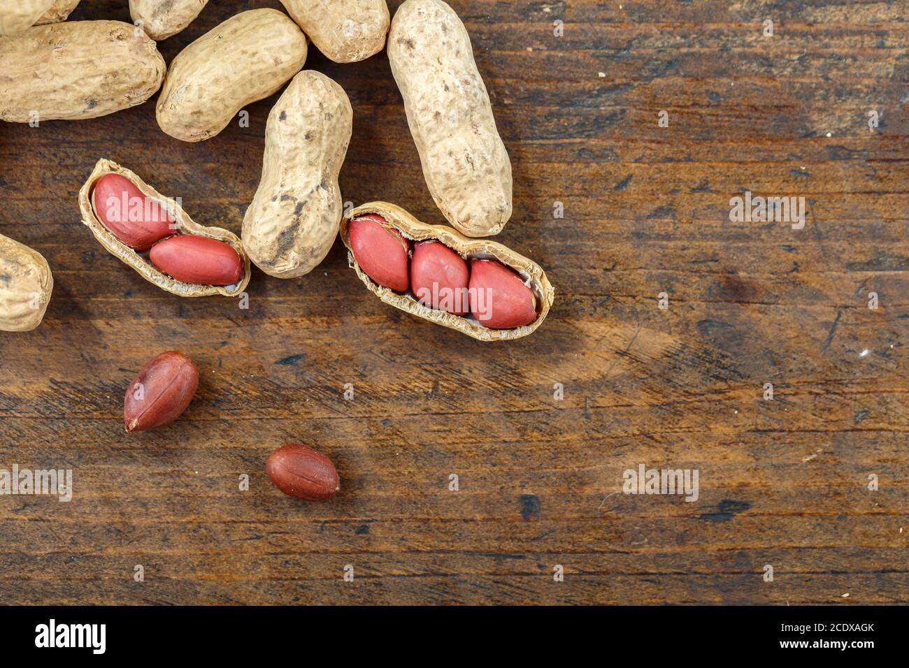 Peanut in a shell texture. Top view Stock Photo - Alamy