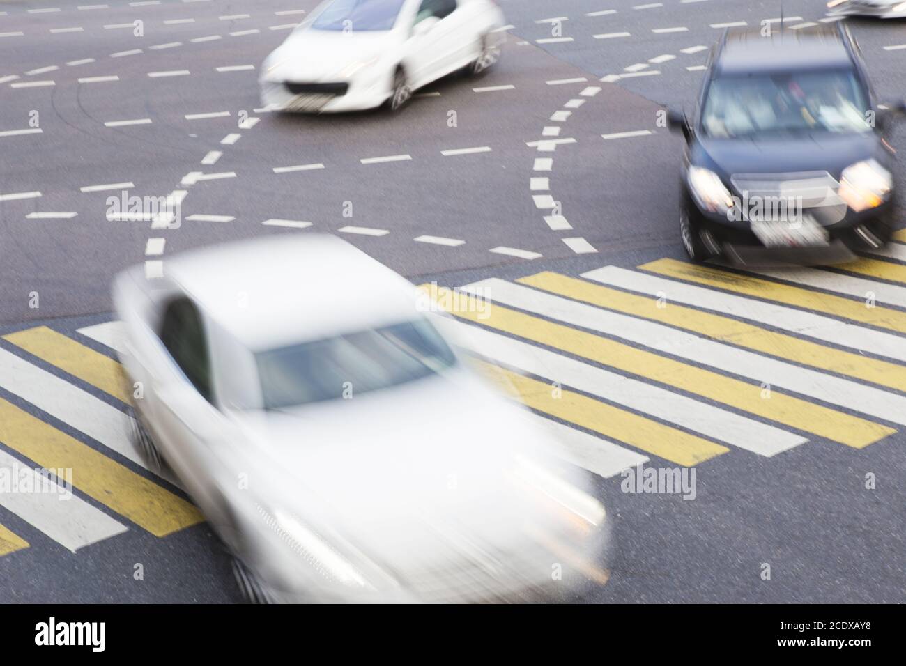 high-speed movement of car at automobile intersection in city Stock ...