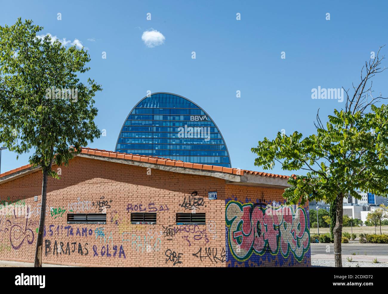 Spanish bank BBVA corporate headquarters in Madrid viewed behind an an ...