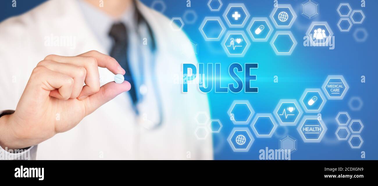 Close-up of a doctor giving you a pill with PULSE inscription, medical ...