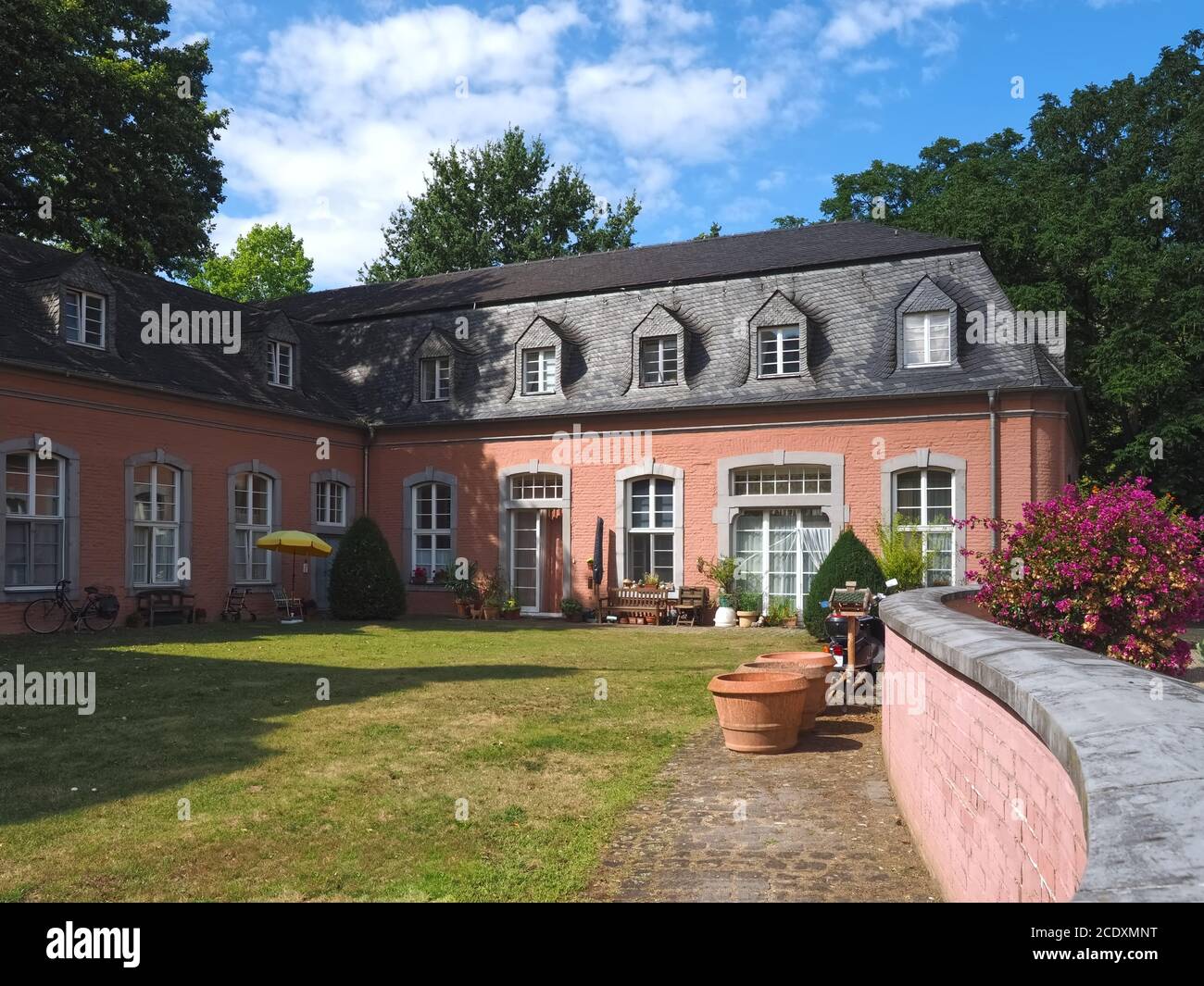Romantic pink castle Schloss Wickrath in Moenchengladbach in Germany ...