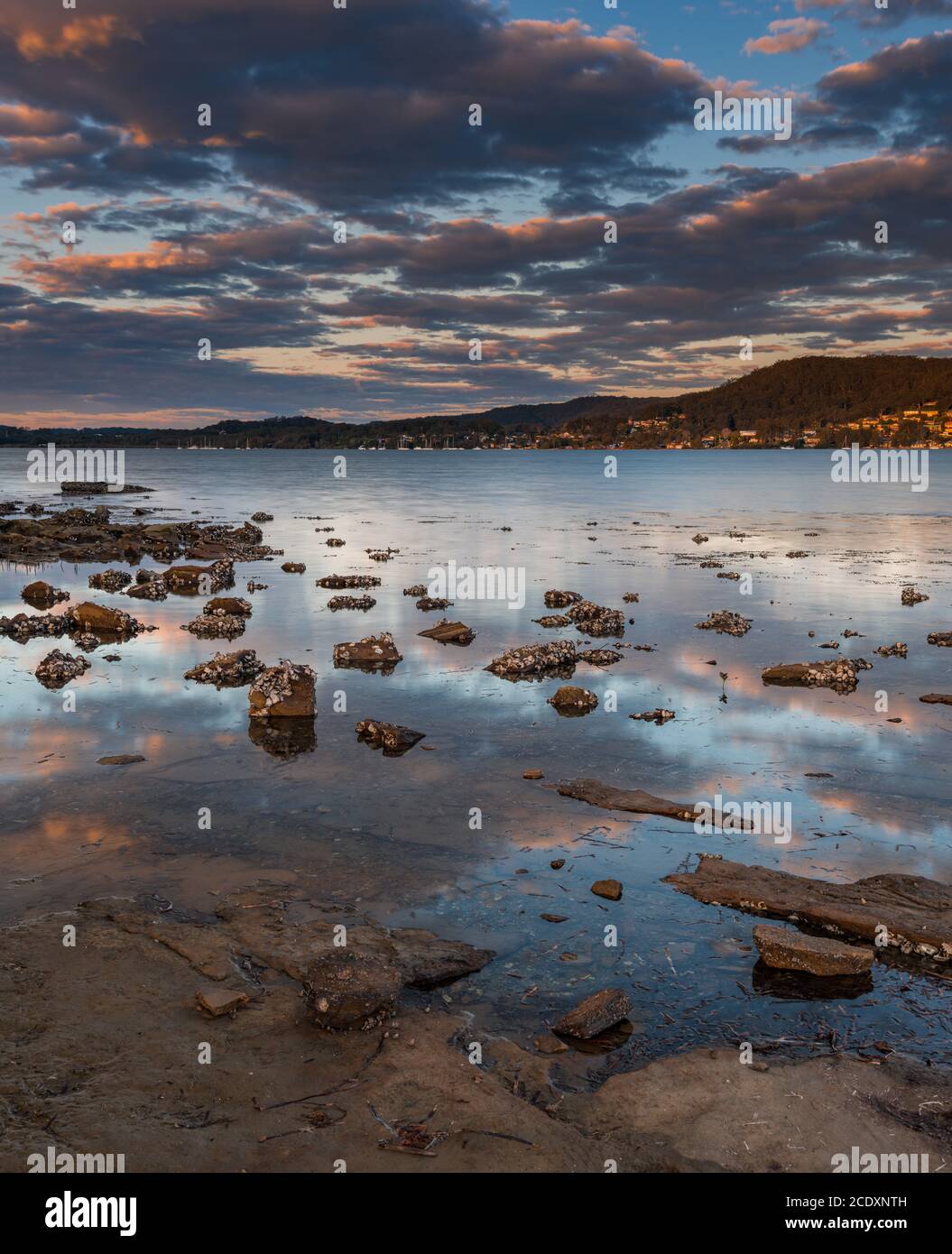 Sunset with Clouds from the rock shelf, a waterscape of Brisbane Water ...