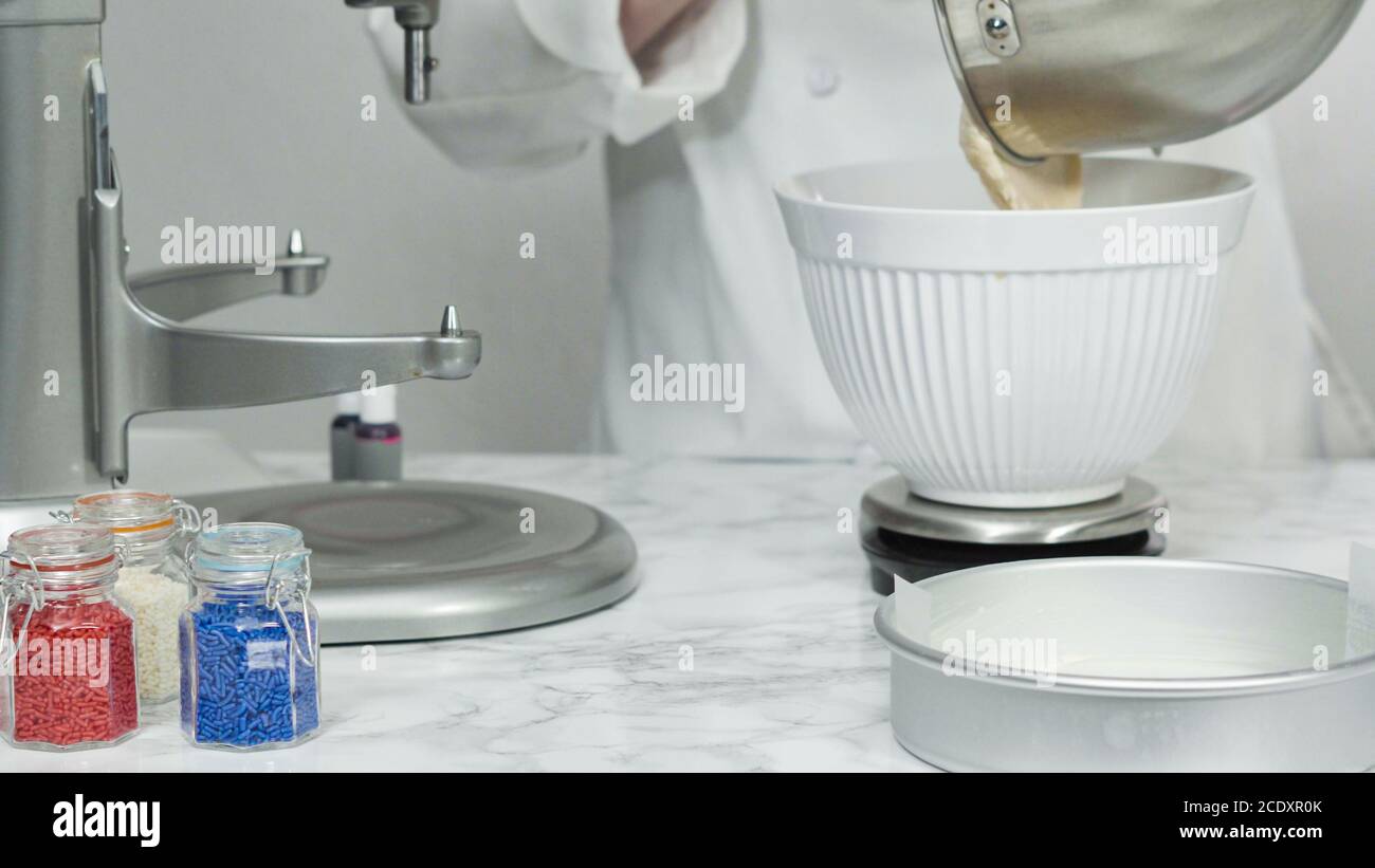 Step by step. Measuring cake batter with a digital kitchen scale to ...