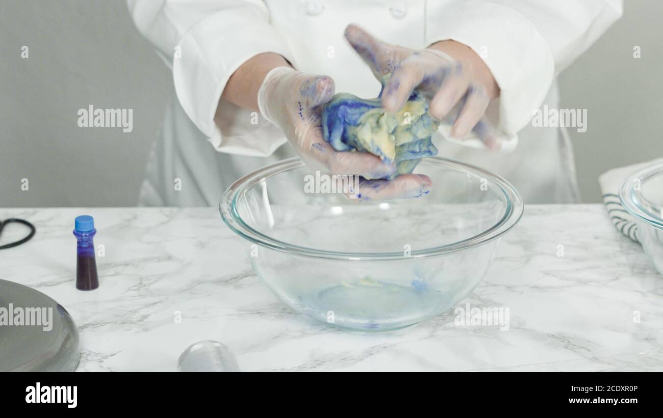 Step by step. Mixing food coloring into the cookie dough to bake red ...