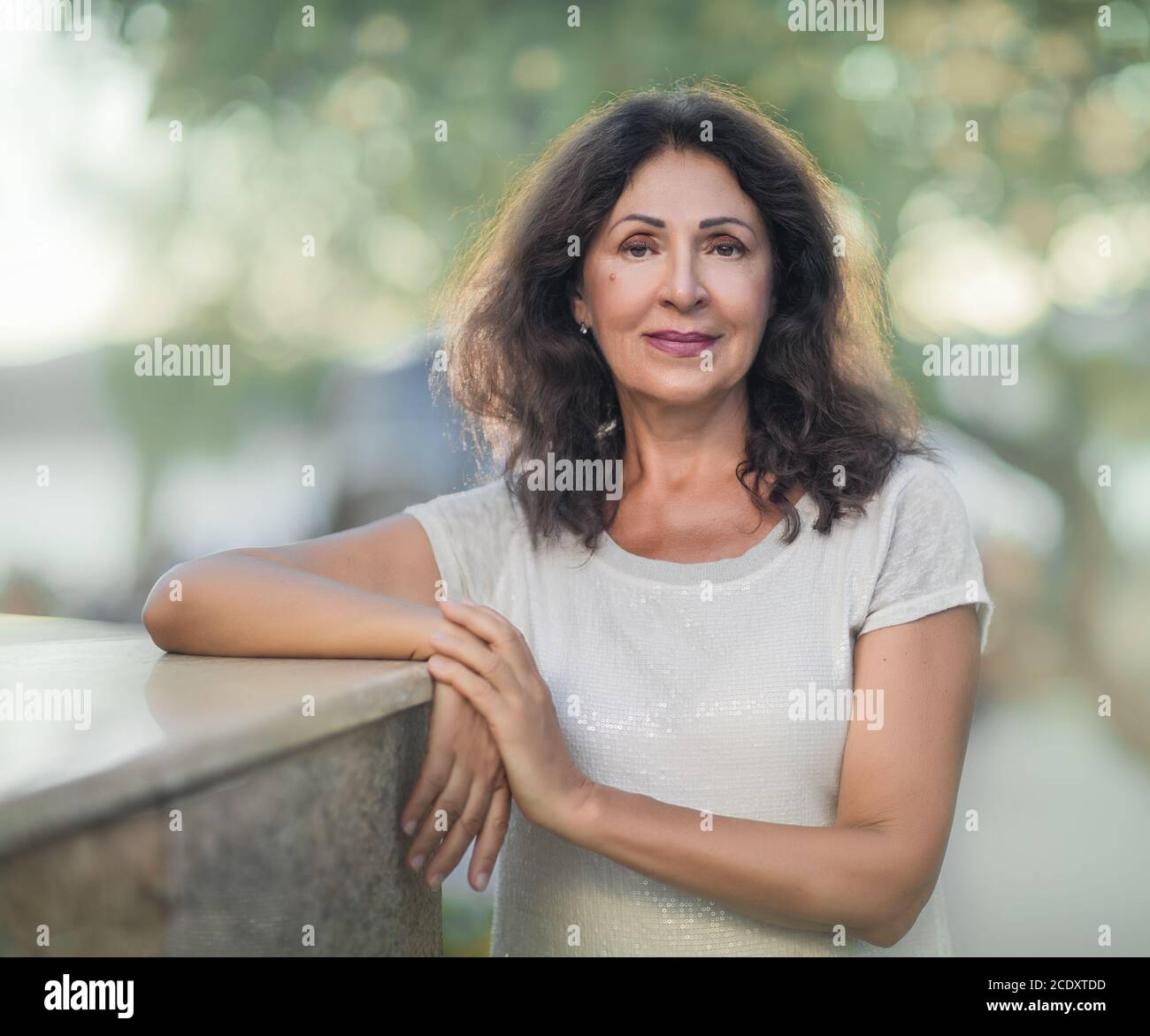 Outdoor portrait of a beautiful senior woman Stock Photo - Alamy