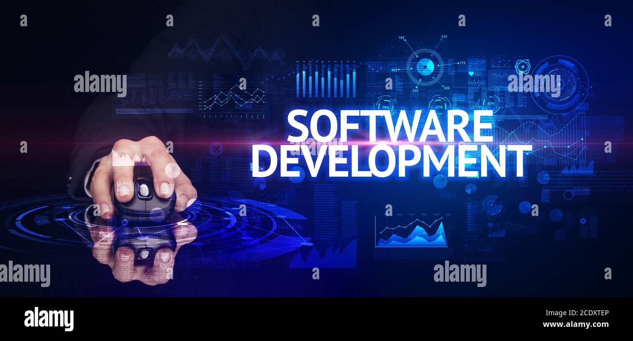 hand holding wireless peripheral with SOFTWARE DEVELOPMENT inscription ...