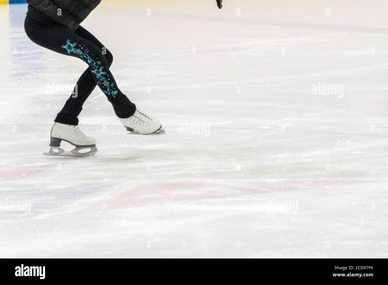View of figure skater feet at the figure skating practice Stock Photo ...