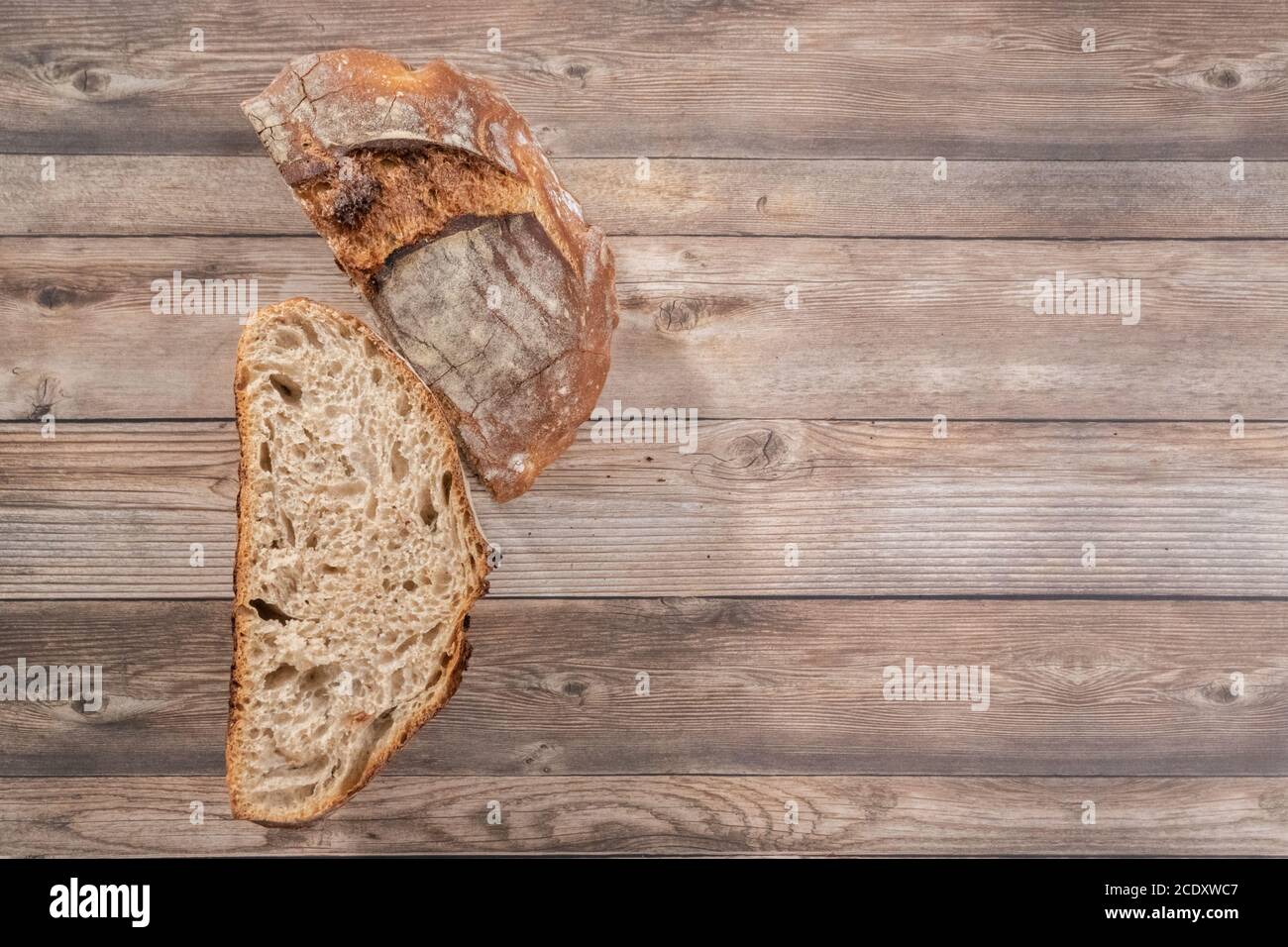 Flat lay. Sliced baked sourdough rye loaf of bread Stock Photo - Alamy