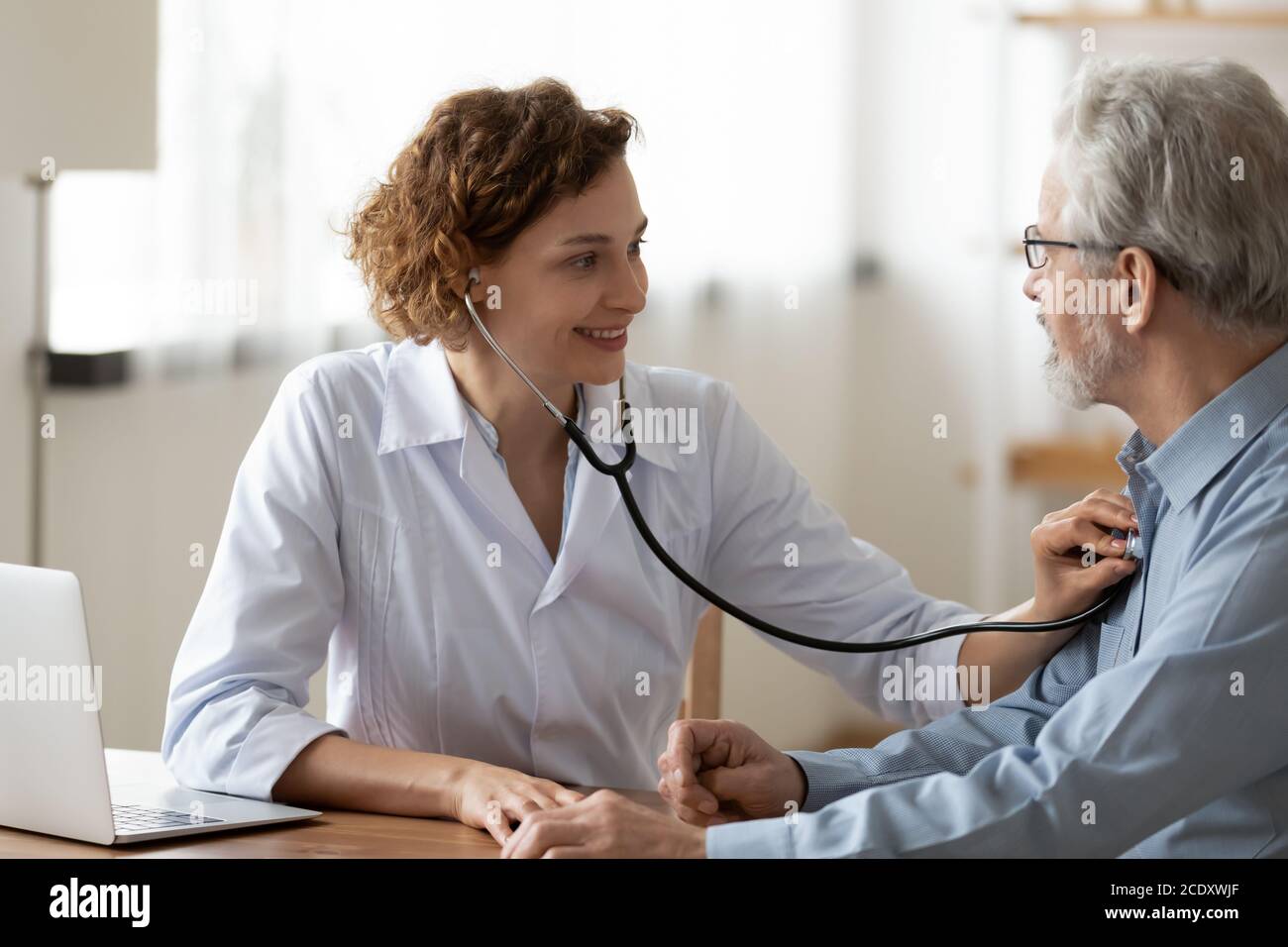 Nurse using stethoscope hi-res stock photography and images - Alamy