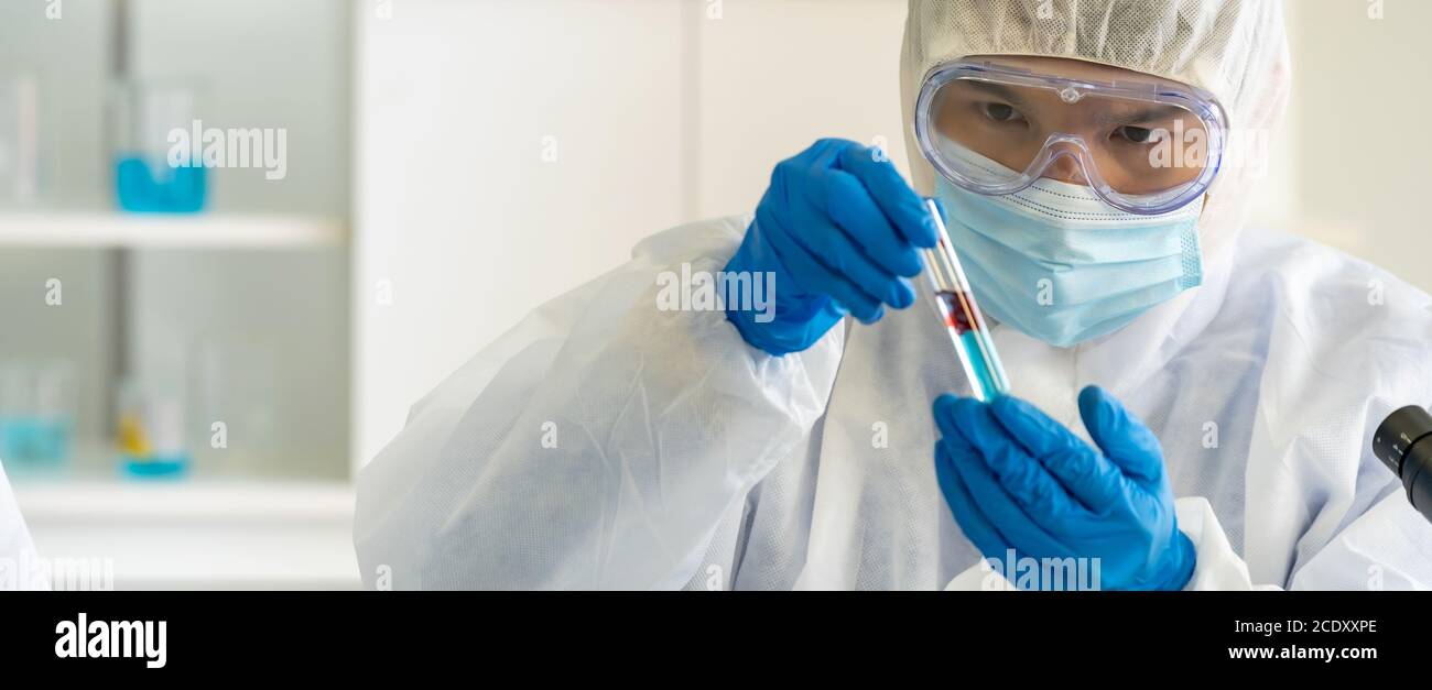 Scientists testing and researching Stock Photo - Alamy