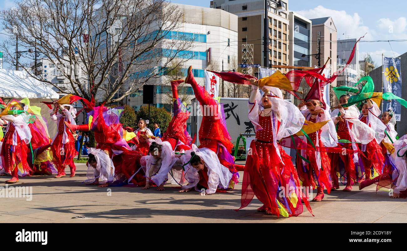 Japanese team of yosakoi child dancers, 9-10 year old, dancing in ...