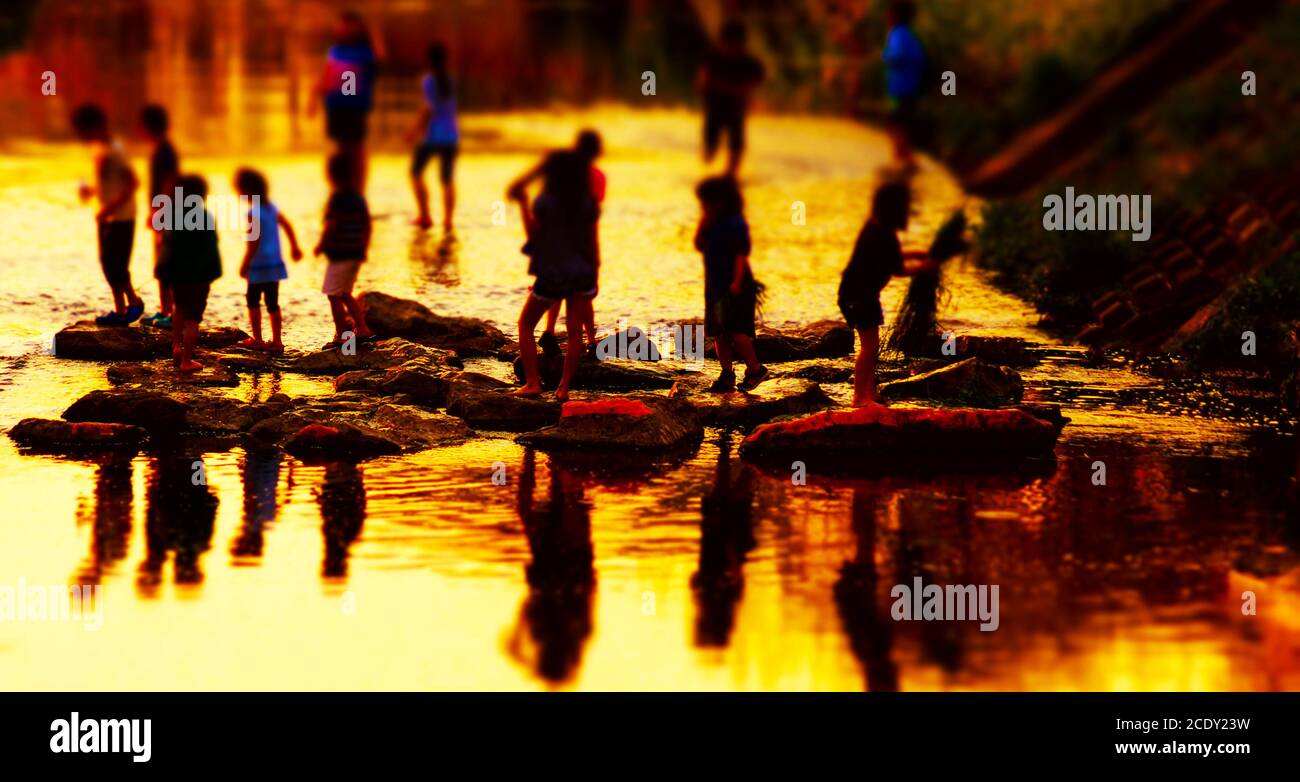 Children playing in river hi-res stock photography and images - Alamy