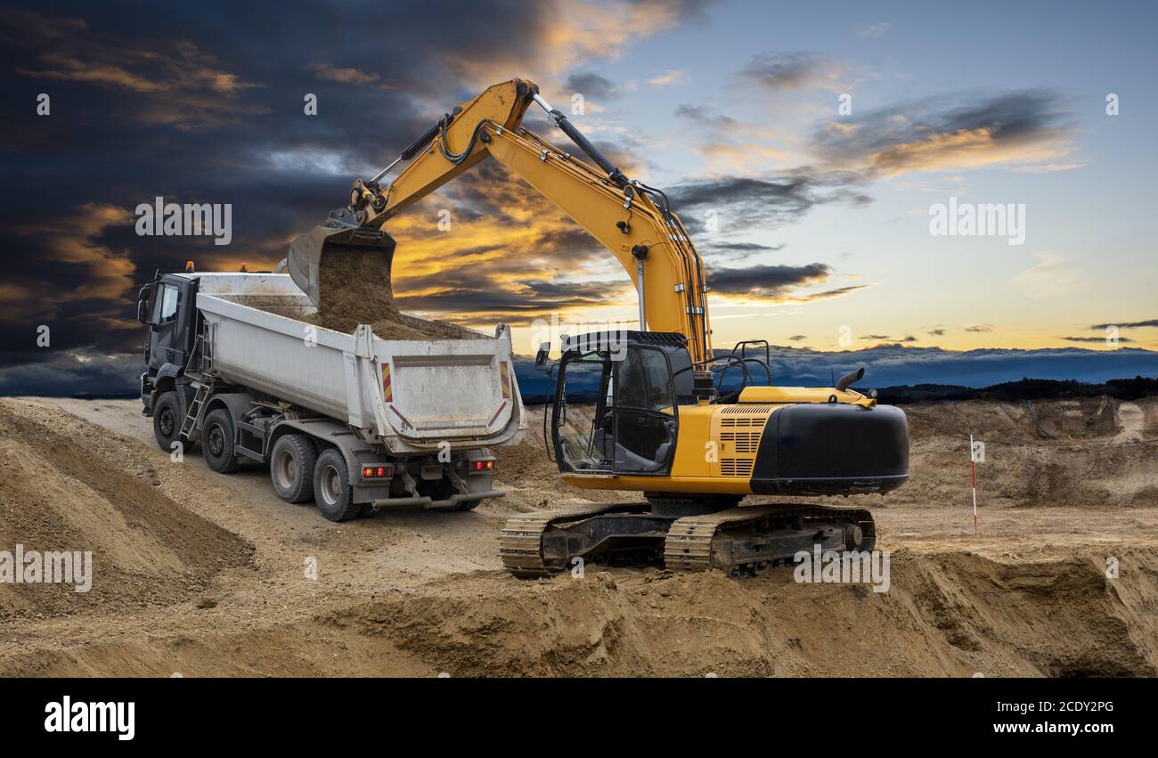 excavator at construction site Stock Photo - Alamy