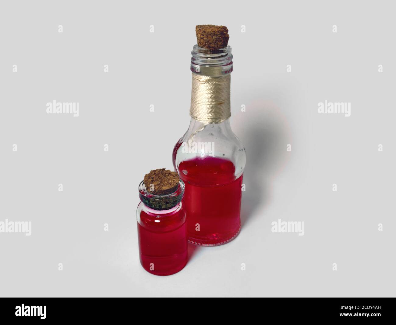 Potions with red liquid. Alchemy set with flasks. small glass bottles ...