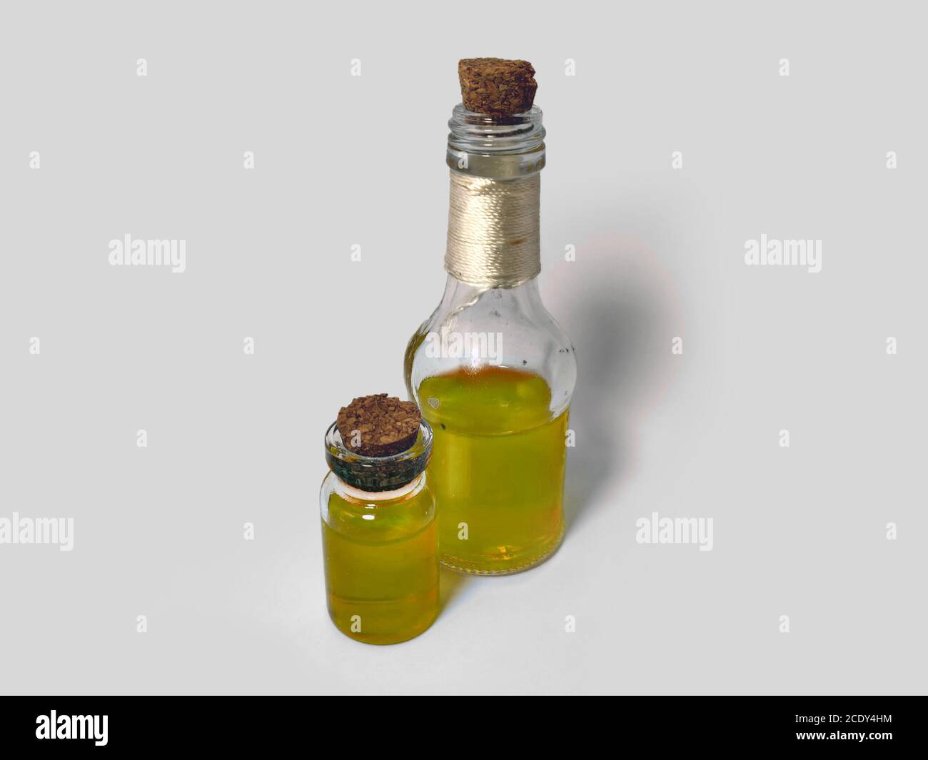 Potions with yellow liquid. Alchemy set with flasks. small glass ...