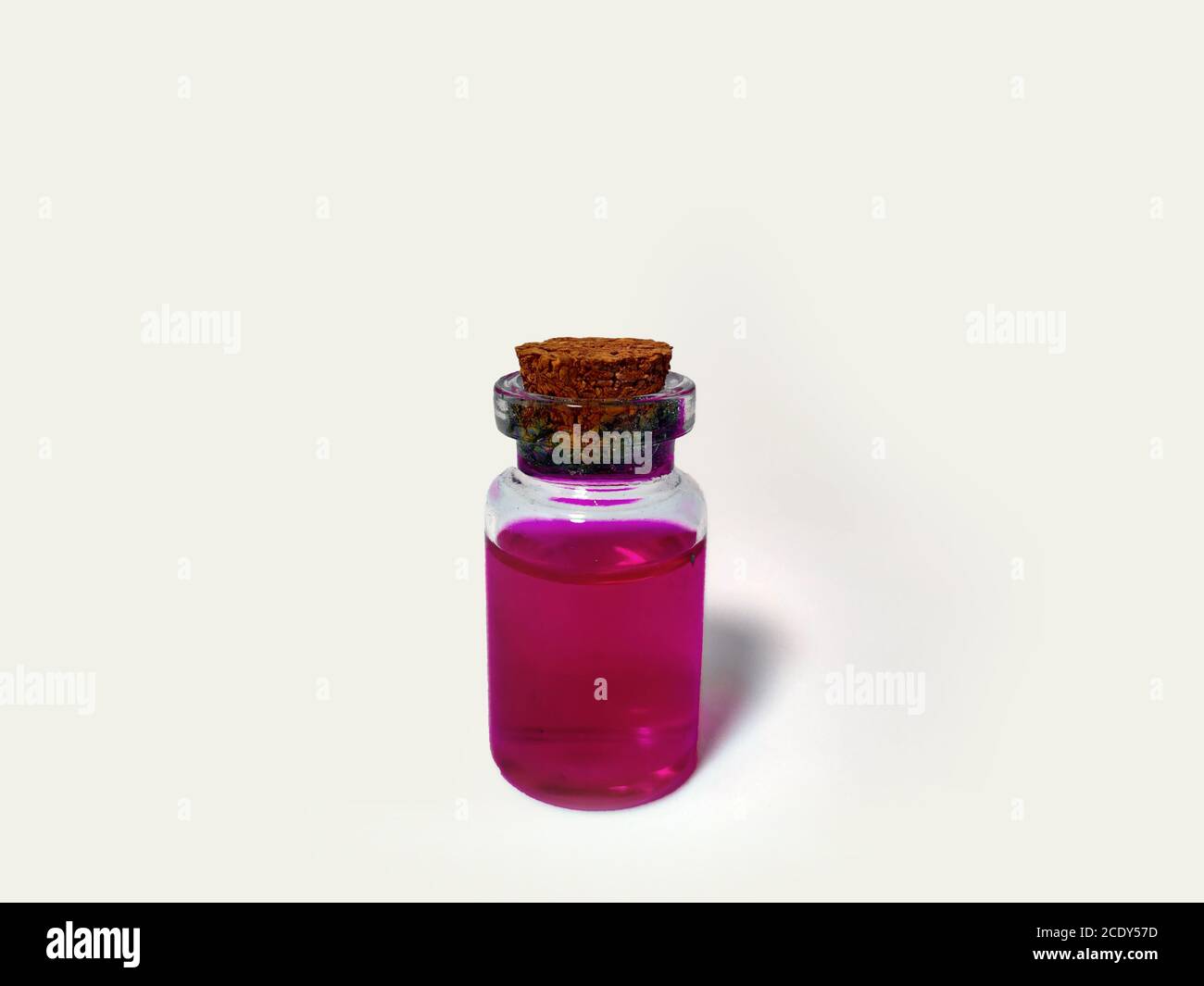 Potion with pink liquid. Alchemy set with flask. small glass bottle ...