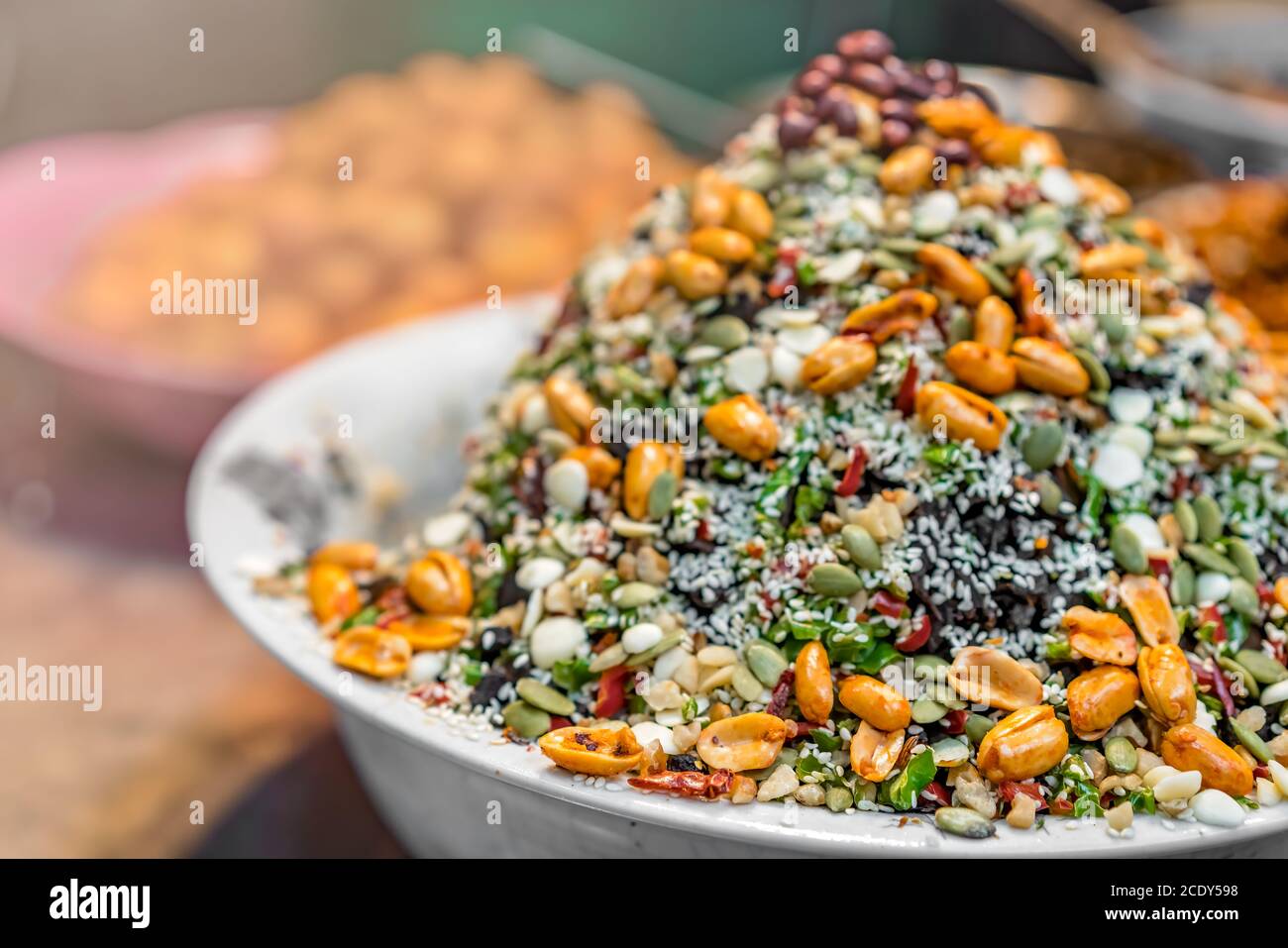 Delicious dessert meal of muesli with oats, grains, nuts and seeds ...