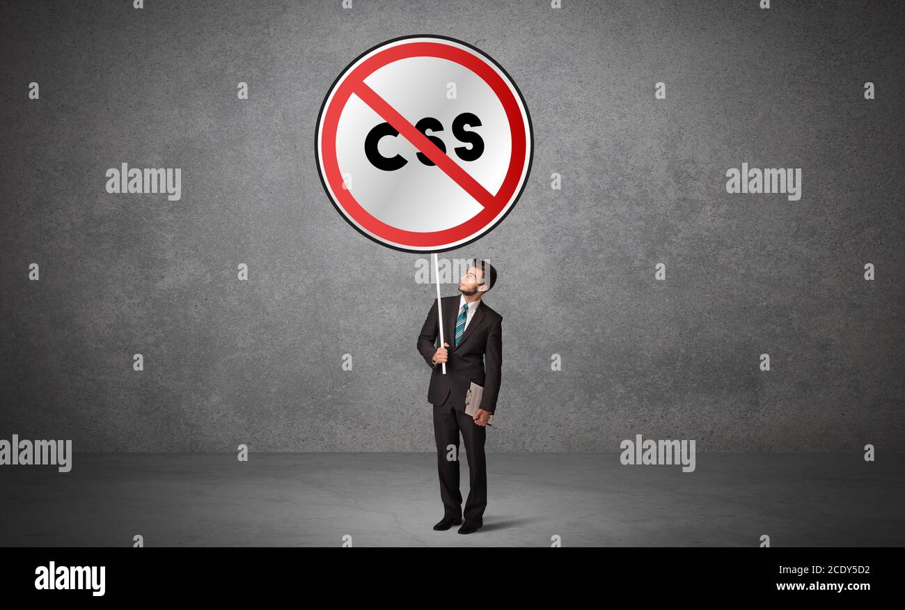 Young business person holdig traffic sign with CSS abbreviation ...