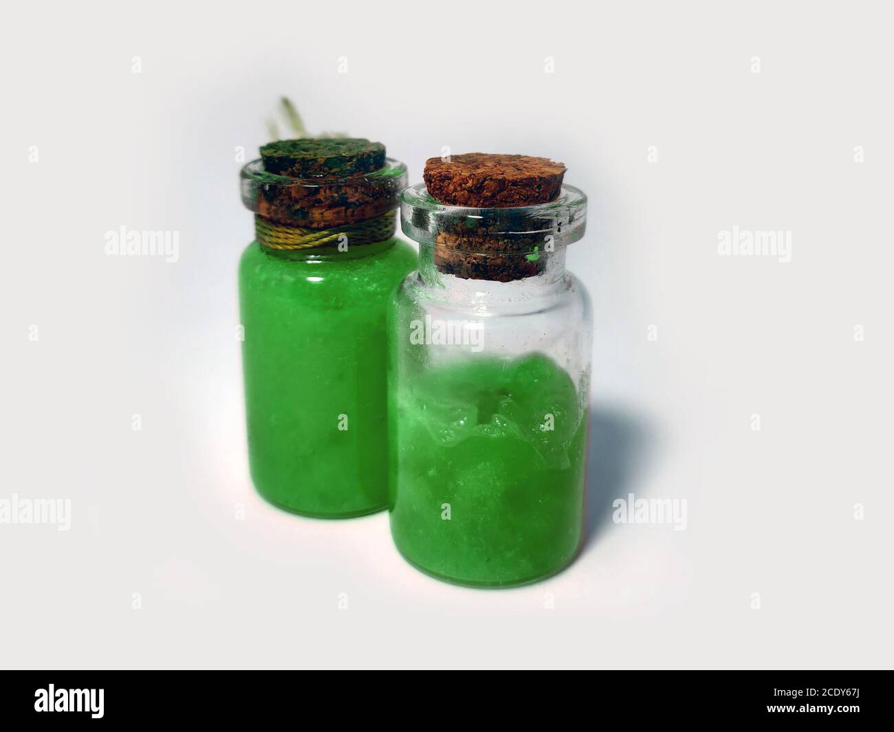 Potions with green liquid. Alchemy set with flasks. small glass bottles ...