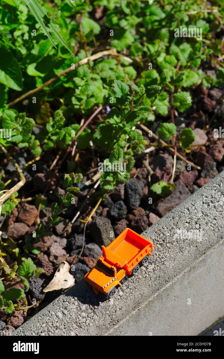 orange color miniature public works truck Stock Photo - Alamy