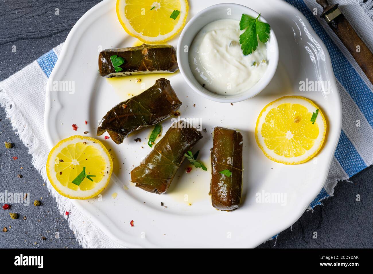 Dolmades - stuffed grape leaves the Greek way Stock Photo - Alamy