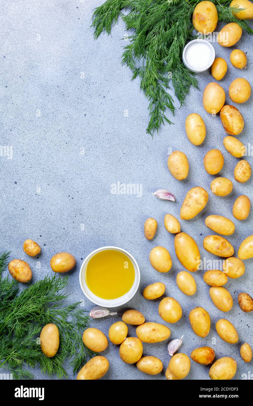Raw new potatoes for baking Stock Photo - Alamy
