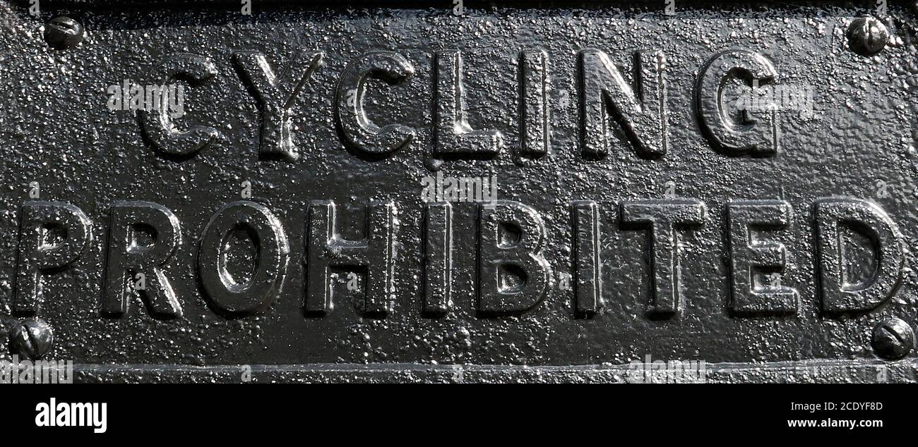 Old painted metal cycling prohibited sign on a park gate Stock Photo ...