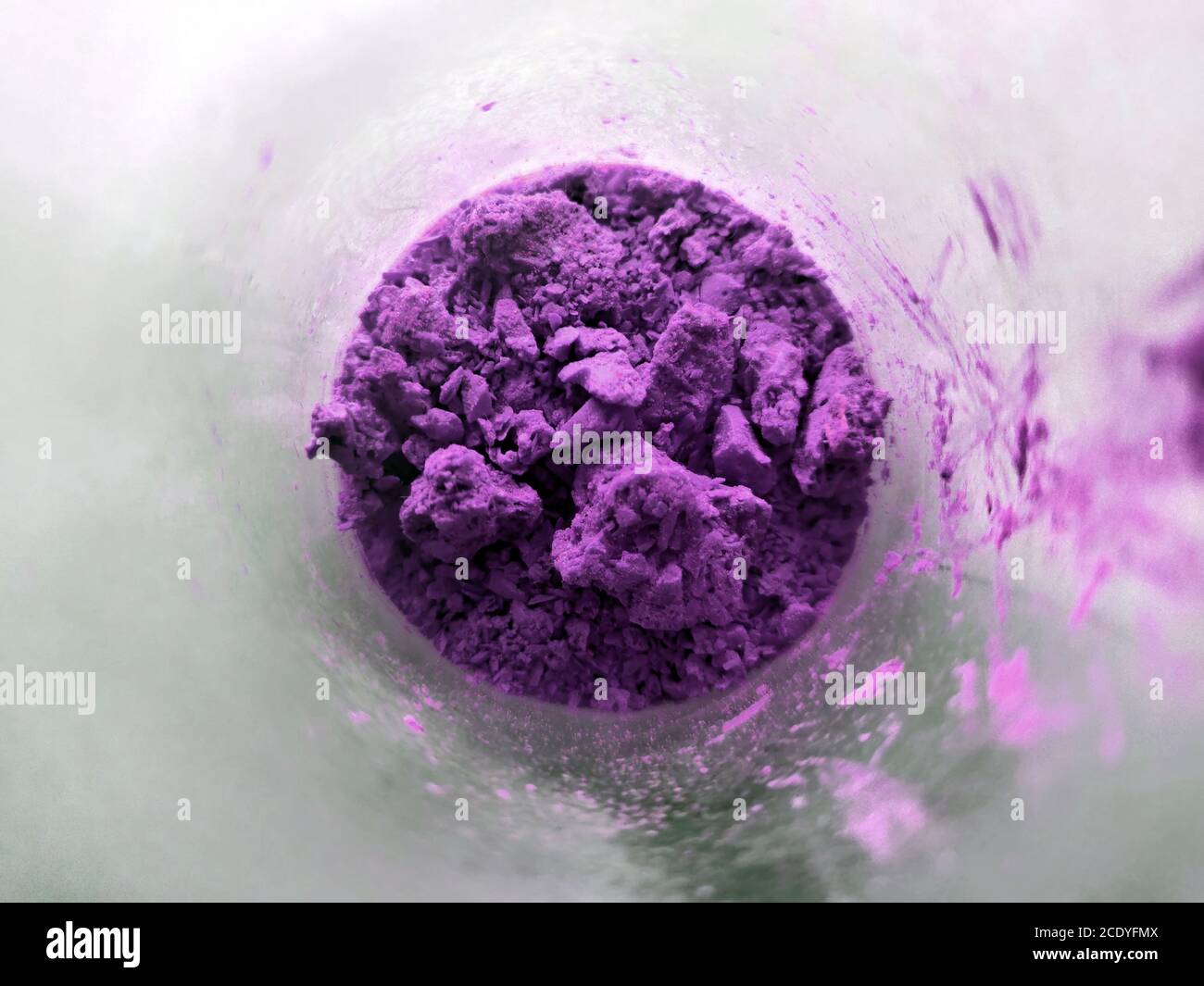 Purple powder in glass cup, bowl with ingredient close up. colored ...