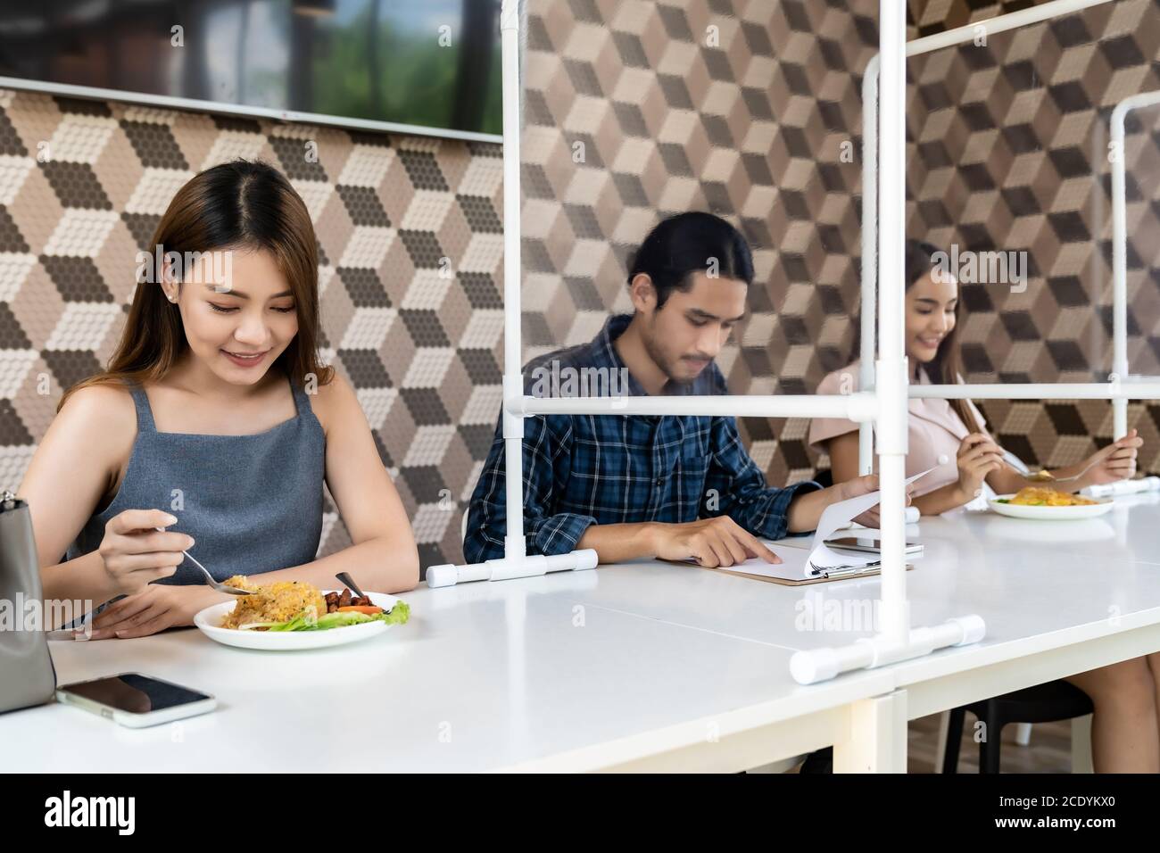 Social distancing asian customer in restaurant Stock Photo - Alamy