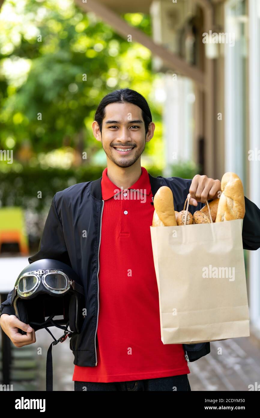 Man with grocery bag hi-res stock photography and images - Alamy