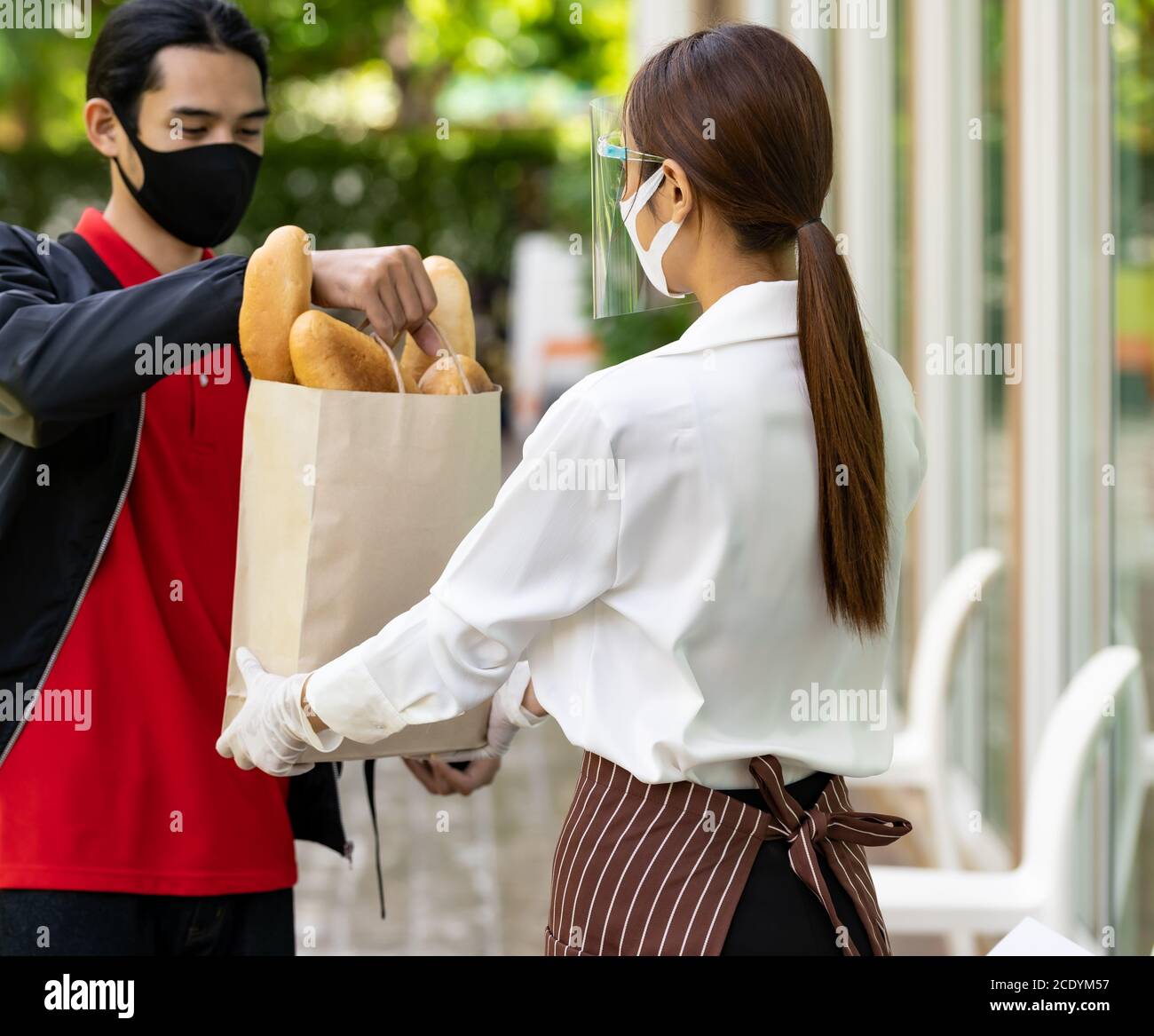 Deliverly man pick up order Stock Photo - Alamy