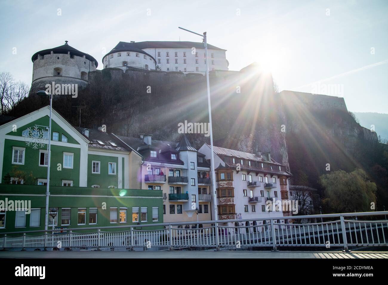 Historical town scape with Kufstein Fortress on a hillside and ...