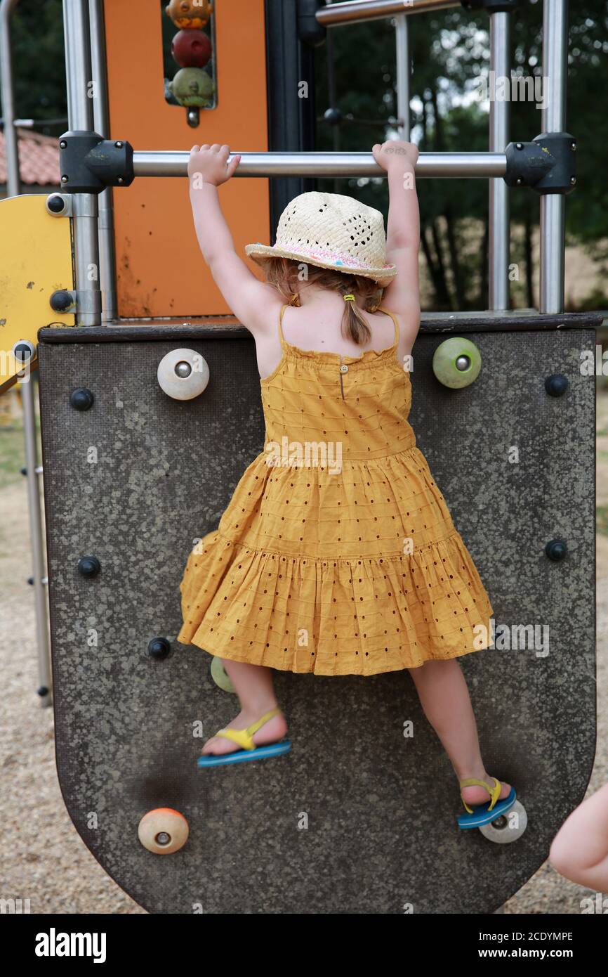 Child girl climbing frame hi-res stock photography and images - Alamy
