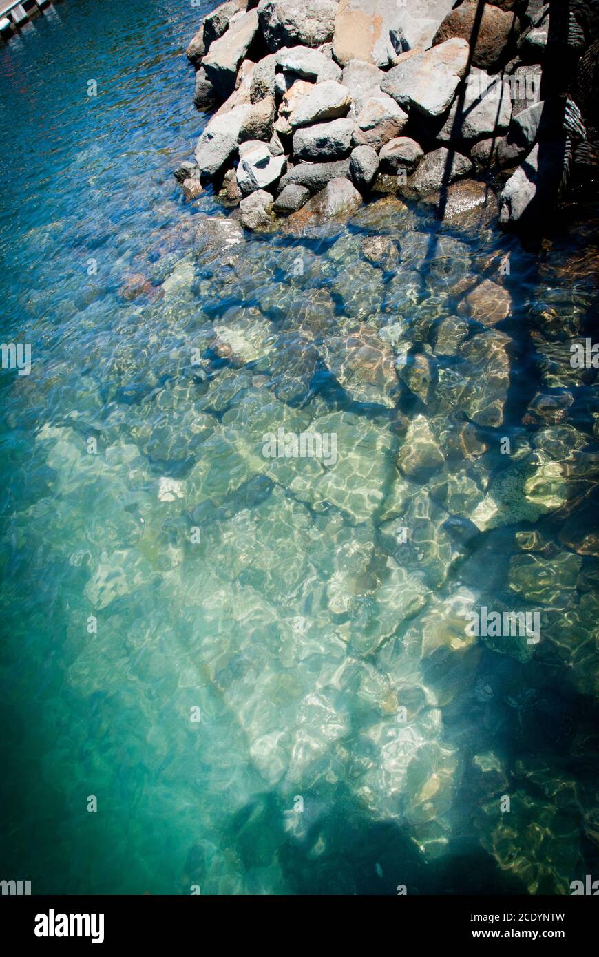 Waterfront made of rocks in the harbor of Picton Stock Photo - Alamy