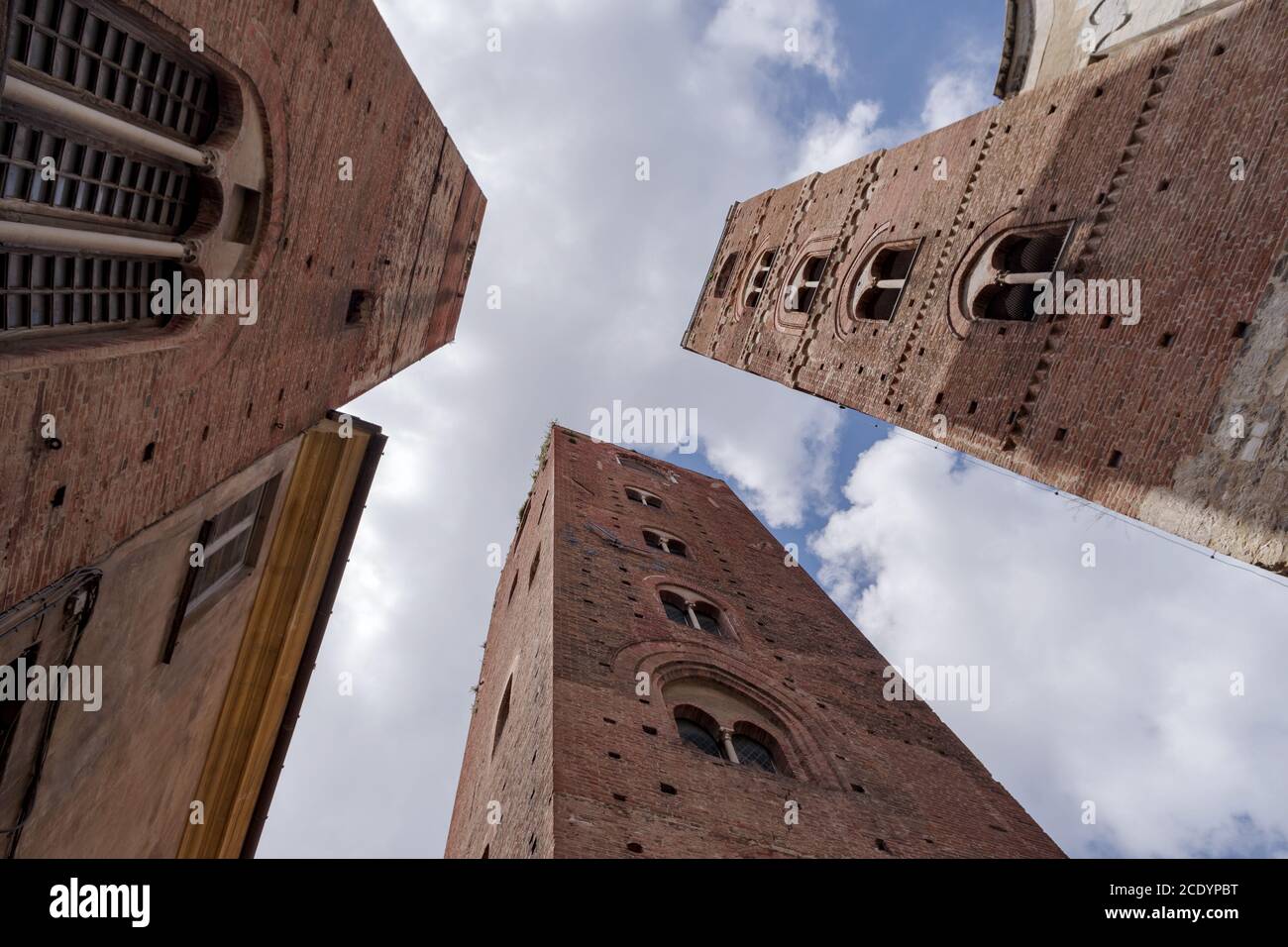 Medieval towers of Albenga, low angle view, Liguria region, Province of ...